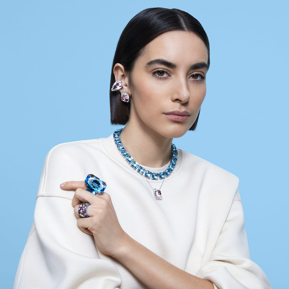 Mesmera clip earring Trilliant cut crystal, White, Rhodium plated ...